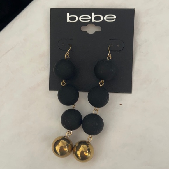bebe | Jewelry | New Bebe Black Gold Ball Swinging Earrings | Poshmark